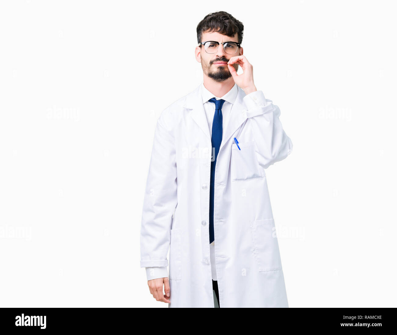 Young professional scientist man wearing white coat over isolated ...