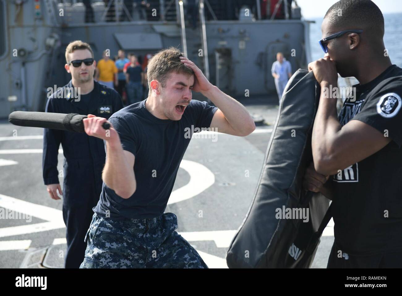 MEDITERRANEAN SEA (Feb. 16, 2017) Ensign Raymond Long performs a baton ...