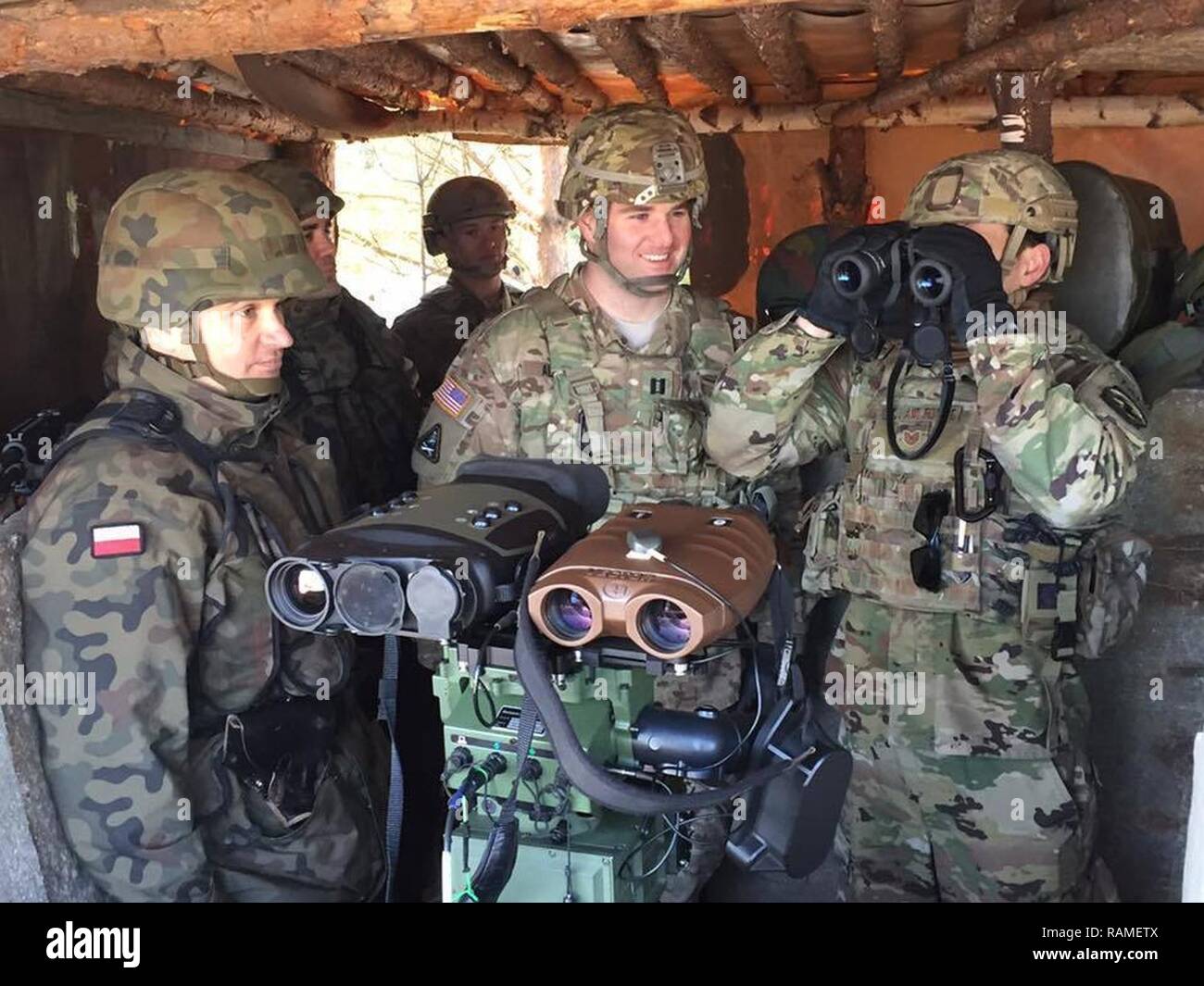 Capt. Daniel Allison (center), fire support officer for 4th Squadron ...