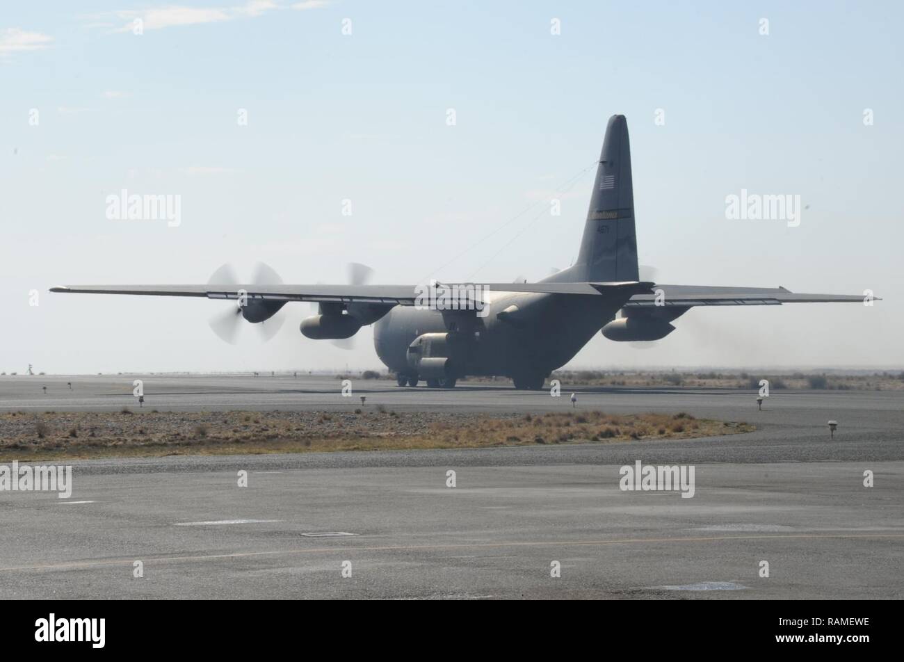 A 737th Expeditionary Airlift Squadron C-130 Hercules taxis down the ...