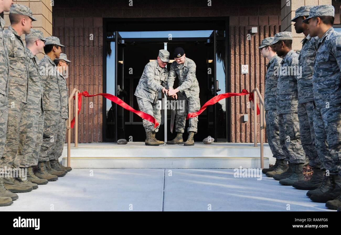 Col. Paul Murray, 99th Air Base Wing commander, and Airman 1st Class ...