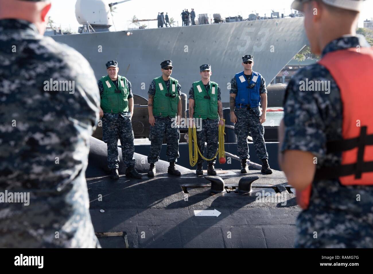 (February 16, 2017) Members of the USS Texas (SSN 775) handle line as ...