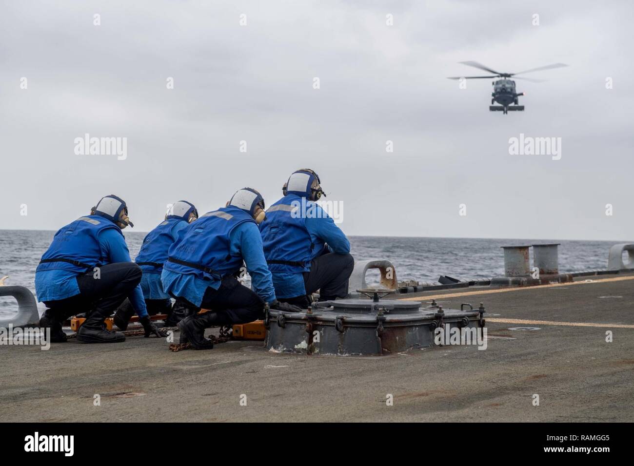 RED SEA (Feb. 14, 2017) -Sailors assigned to the chock and chain team ...