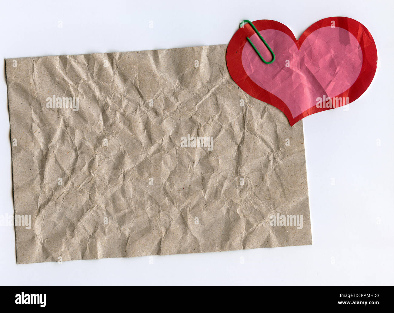 Cardboard and Heart Shape Sticker on Paper Photo Stock Photo - Alamy