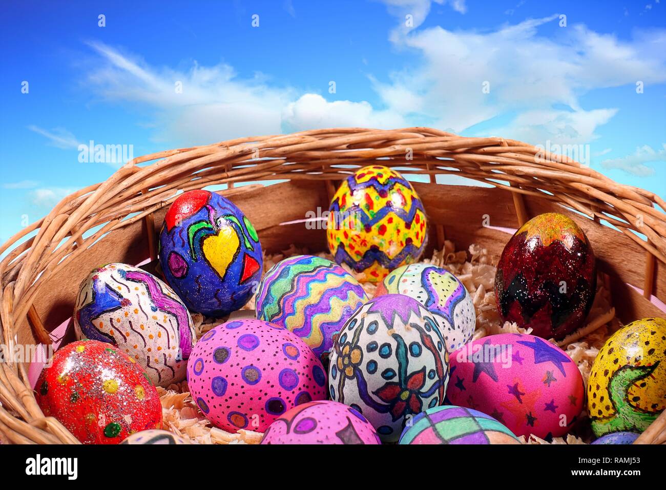 Colorful Paschal Easter Eggs in a Wooden Basket Celebration Traditional ...