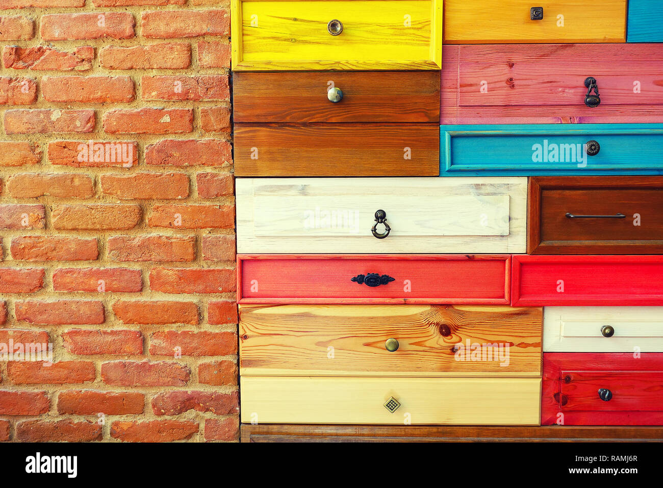 Colorful Wooden Drawer and Brick Wall Photo Stock Photo - Alamy