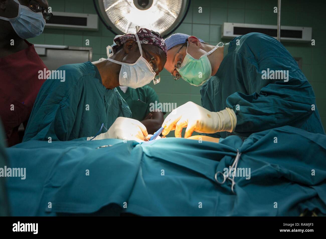 U.S. Army Lt. Col. Neil McMullin, a plastic surgeon assigned to Brooke ...