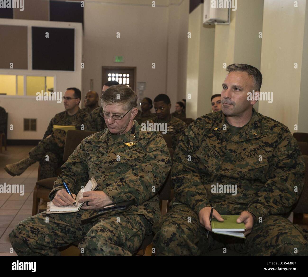 U.S. Navy Cmdr. Wesely Myhand, left, Combat Logistics Regiment 1, 1st ...