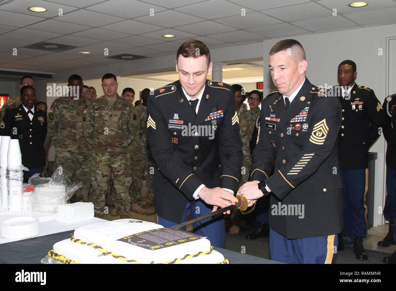Sgt. Travis Bertovich, left, an intelligence analyst with 2nd Battalion ...
