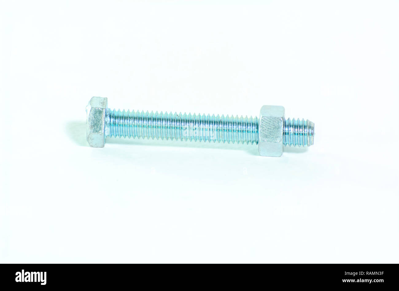 Hex head screw on a white background Stock Photo - Alamy