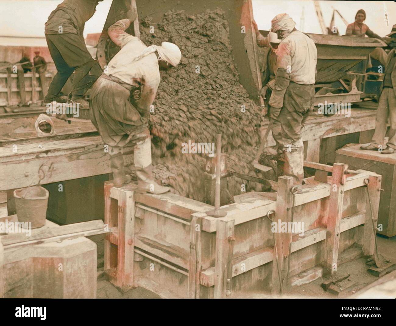Construction of the Haifa harbour. Haifa harbour. Pouring great ...