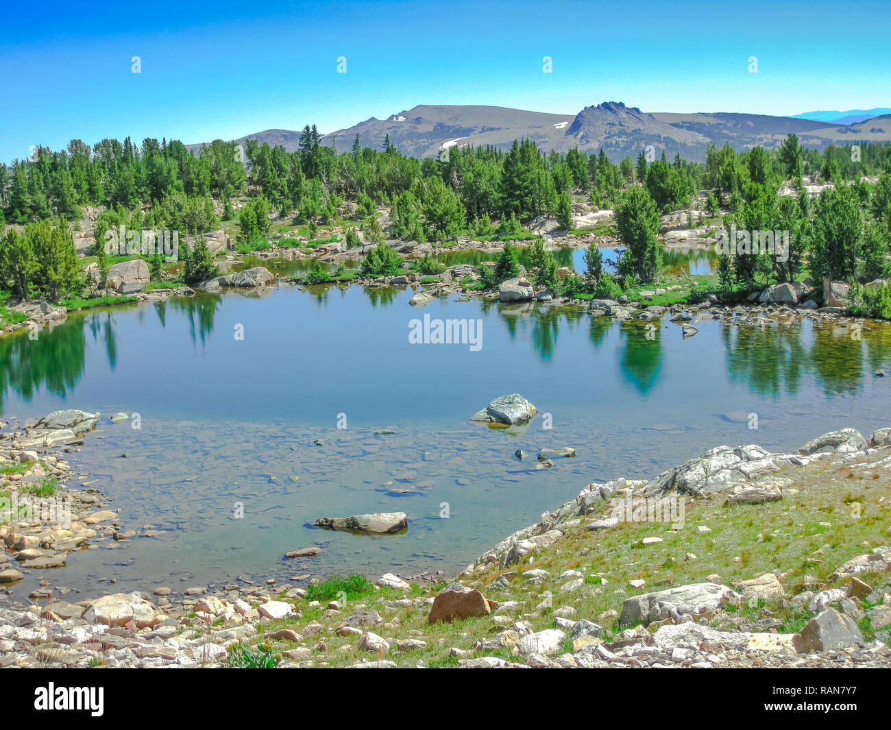 North America road trip. Alpine lake along scenic drive Beartooth ...
