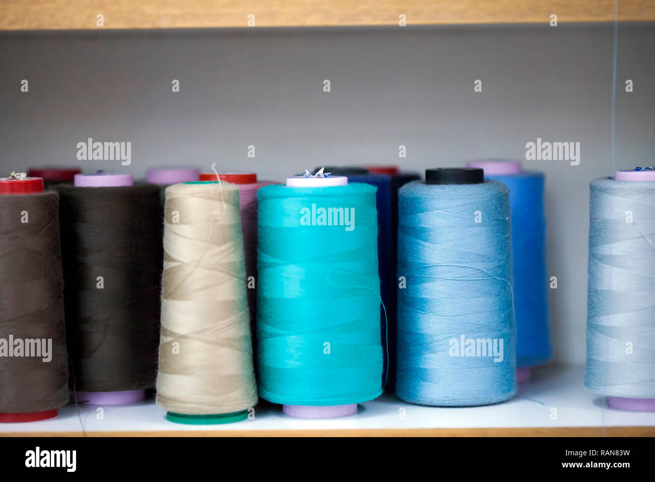 Fiber Fabric Roller on bobbin and light ropes Yarn Photo Stock Photo ...