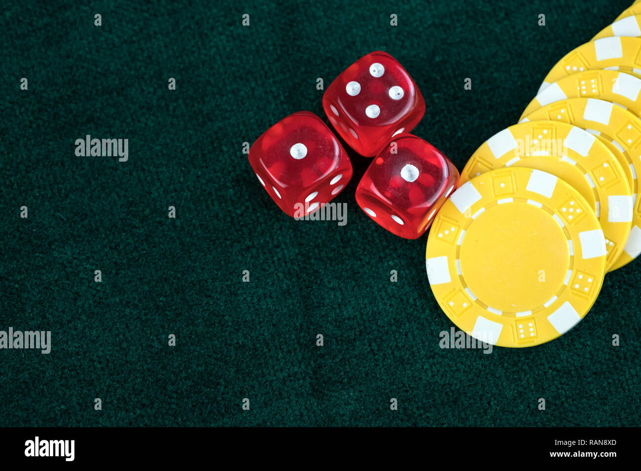 Gambling Red Dice and Casino Money Coins Photo Stock Photo - Alamy