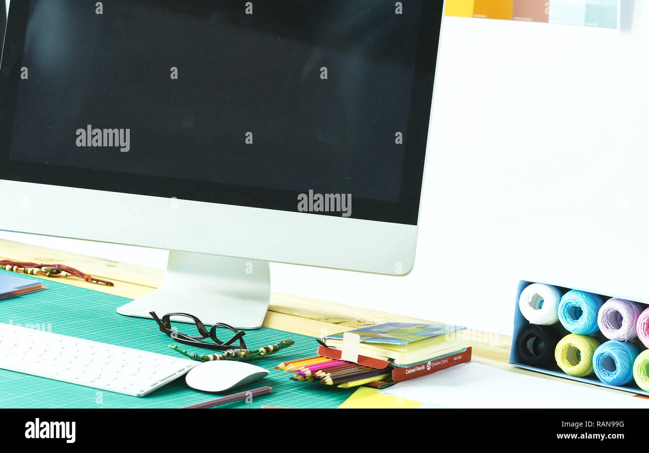 Empty workroom and workplace of tailor or vendor of clothes in small ...
