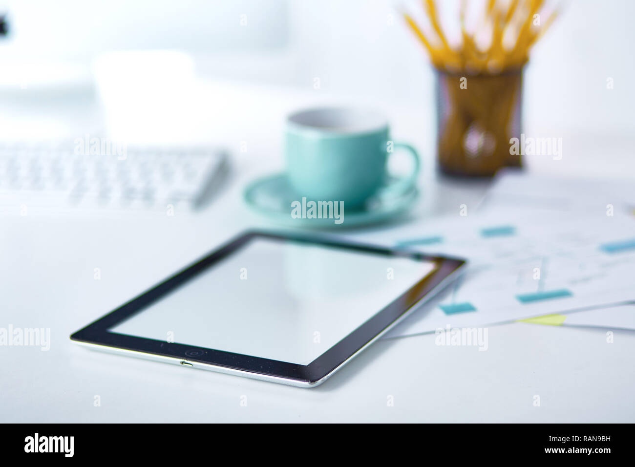 A cup of coffee on the office table Stock Photo - Alamy