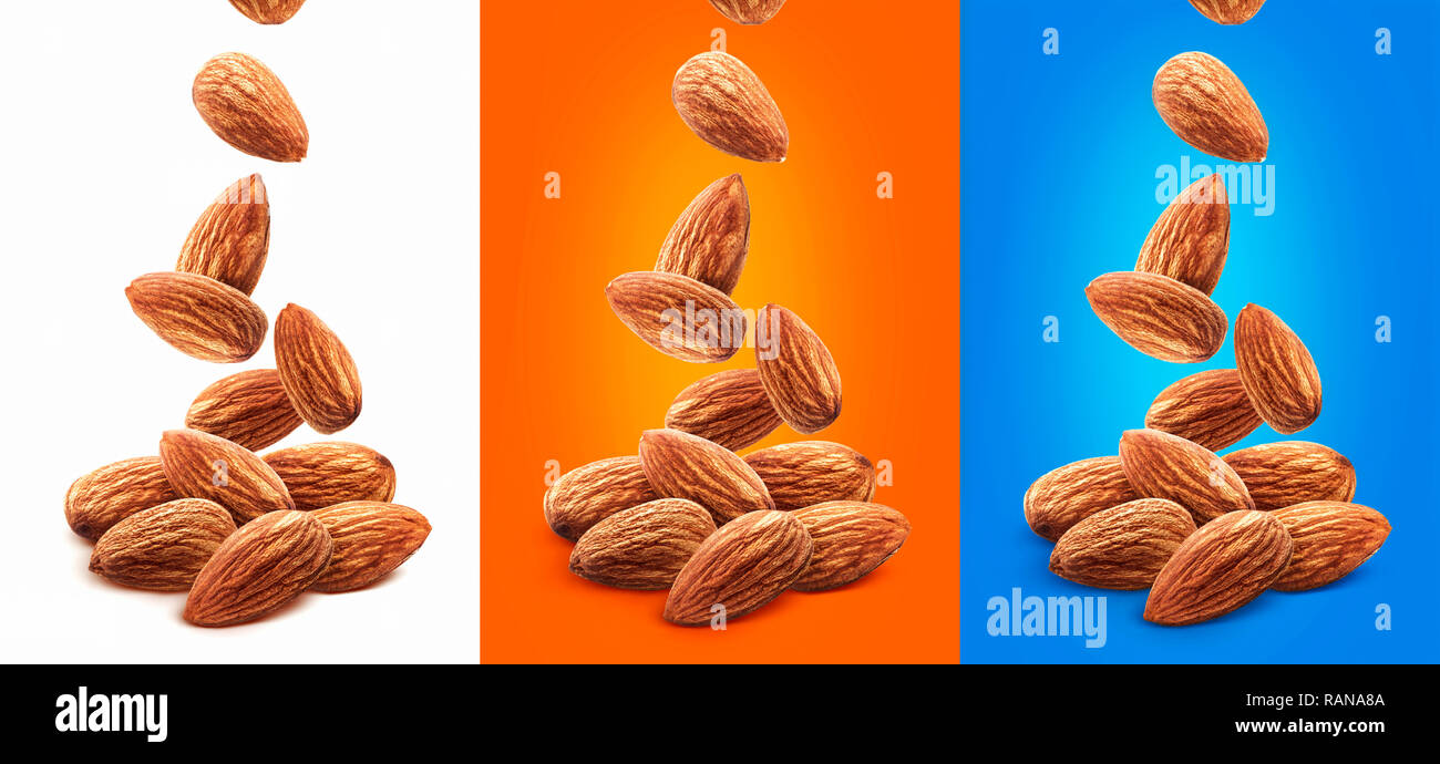Falling almond nuts isolated on white background Stock Photo - Alamy
