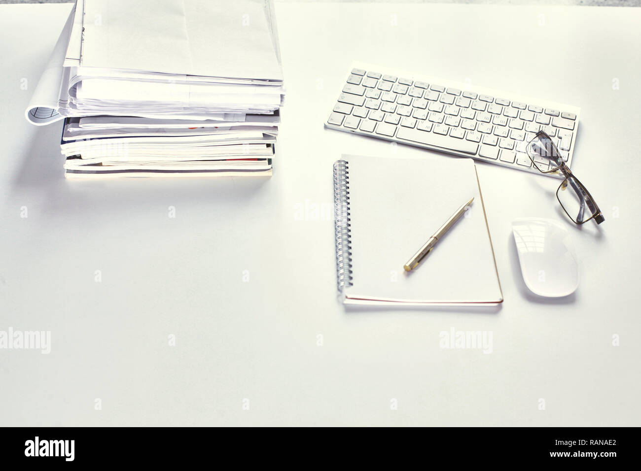 Workspace desktop, documents on the office table Stock Photo - Alamy