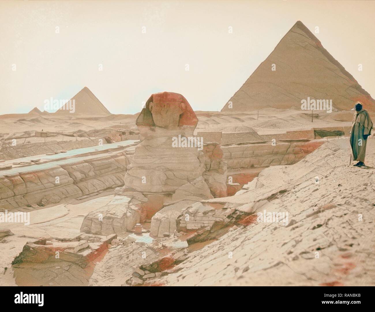 Sphinx & pyramids. Sphinx (front view with two pyramids in background ...