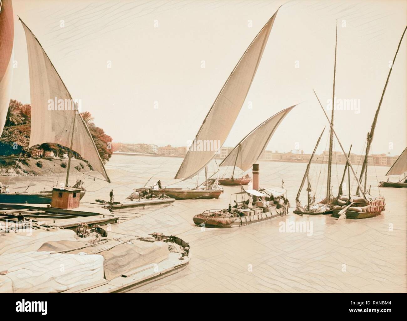 Egypt. River scenes. The Nile. River craft rushing for the open bridge ...