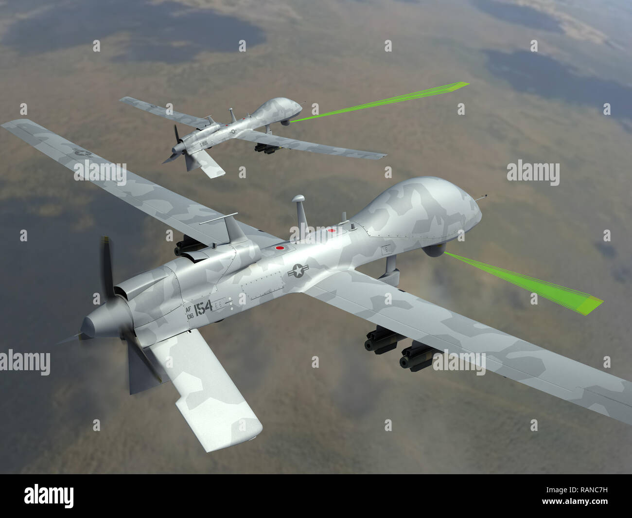 Two military drones scan landscape Stock Photo - Alamy