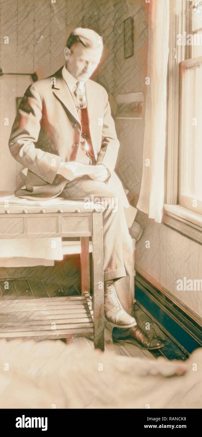 Eric Matson sitting on edge of desk. 1925, Middle East, Israel and/or ...