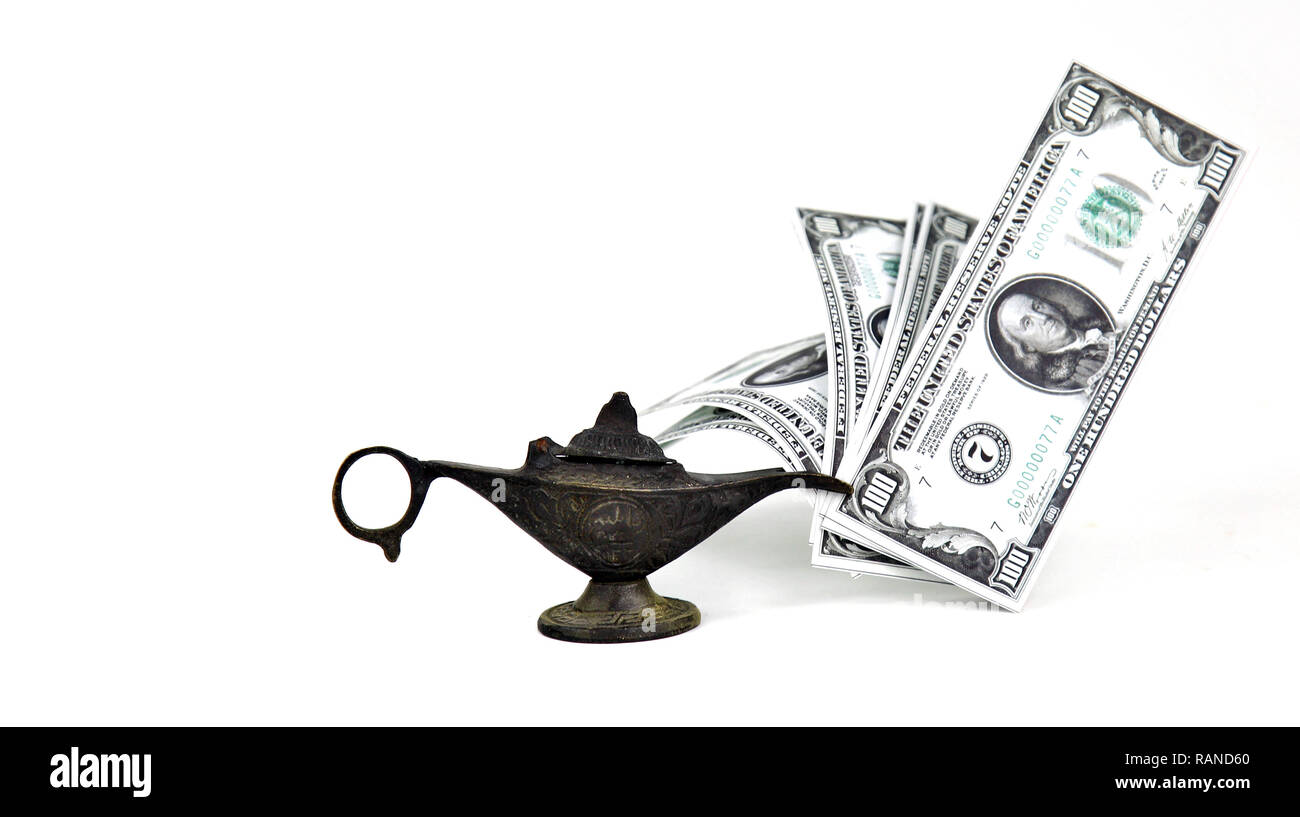 Money Cash Finance Conceps and Aladdin Lamp Photo Stock Photo - Alamy