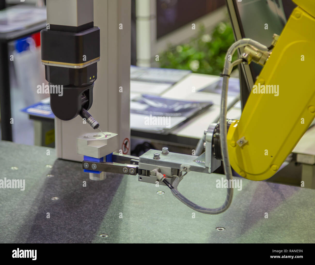 Robotic arm loading workpiece to CNC CMM Coordinate Measuring Robotic ...
