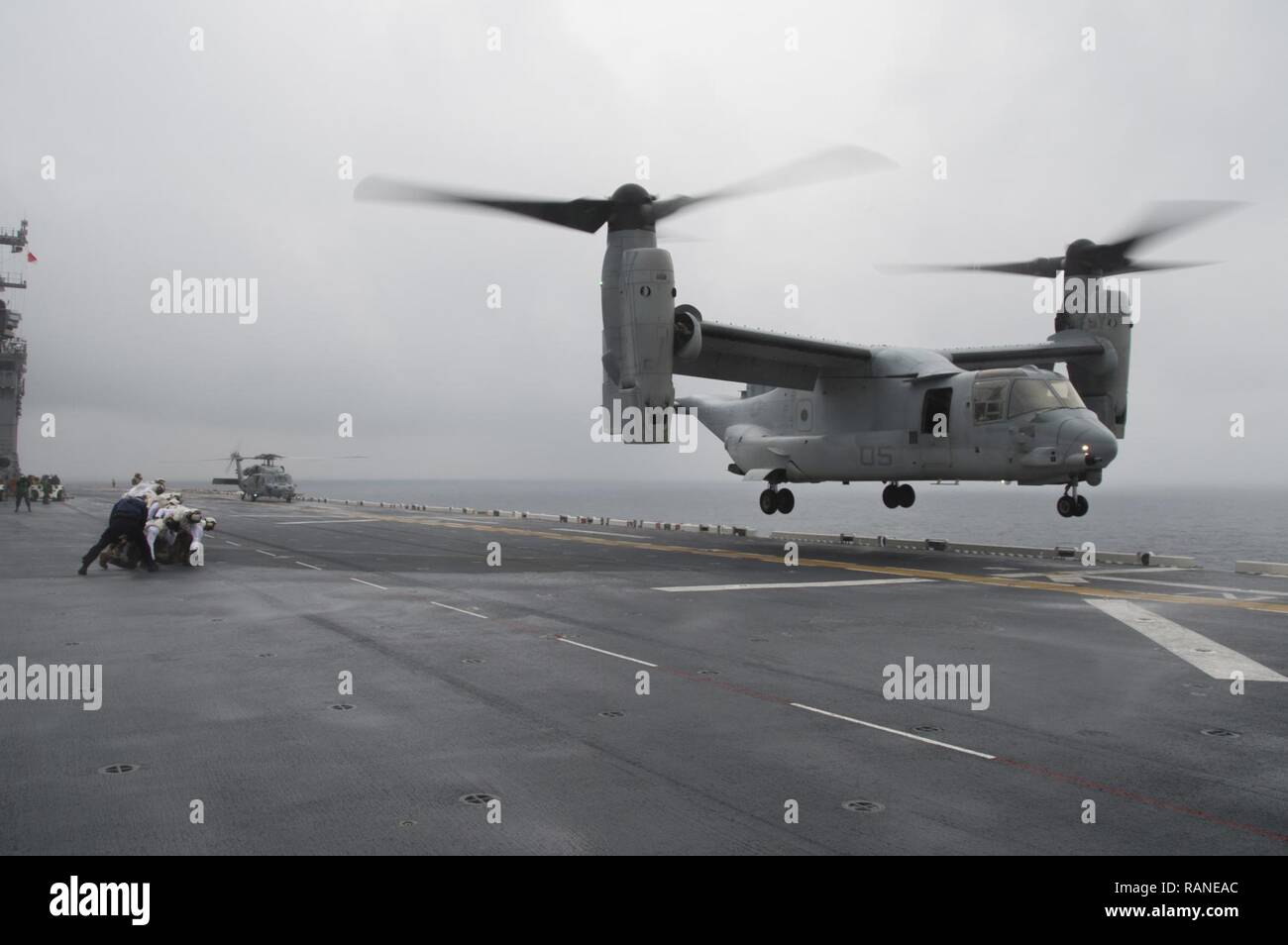 PHILIPPINE SEA (March 1, 2017) Marines assigned to Combat Cargo brace ...