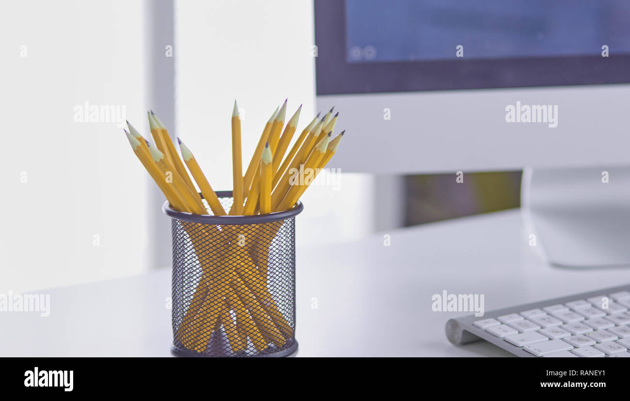 Graphite pencils in a metal grid-container. Concept Stock Photo - Alamy