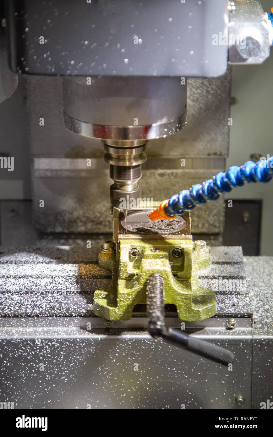 CNC milling machine engraving plastic workpiece, industrial machining ...