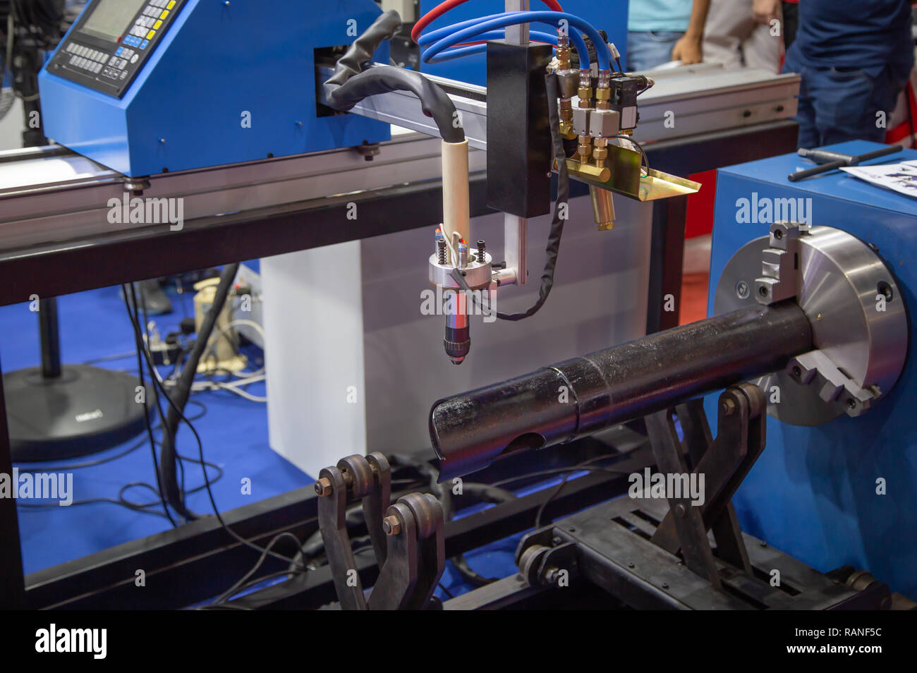 CNC pipe / tube cutting and beveling machine Stock Photo - Alamy