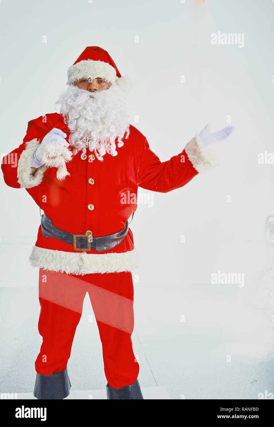 Christmas theme: happy Santa Claus Over white background Stock Photo ...