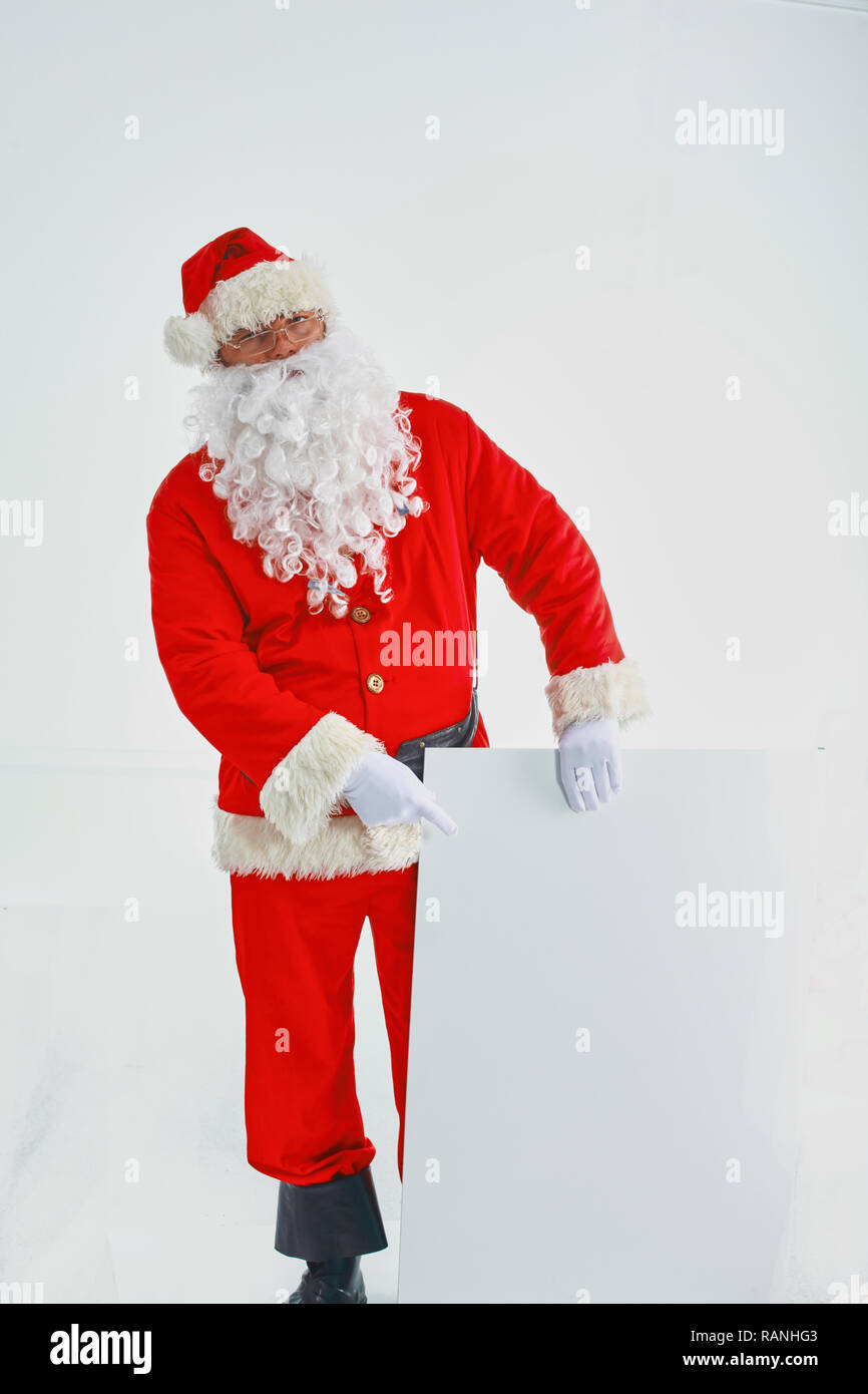 Christmas theme: happy Santa Claus Over white background Stock Photo ...