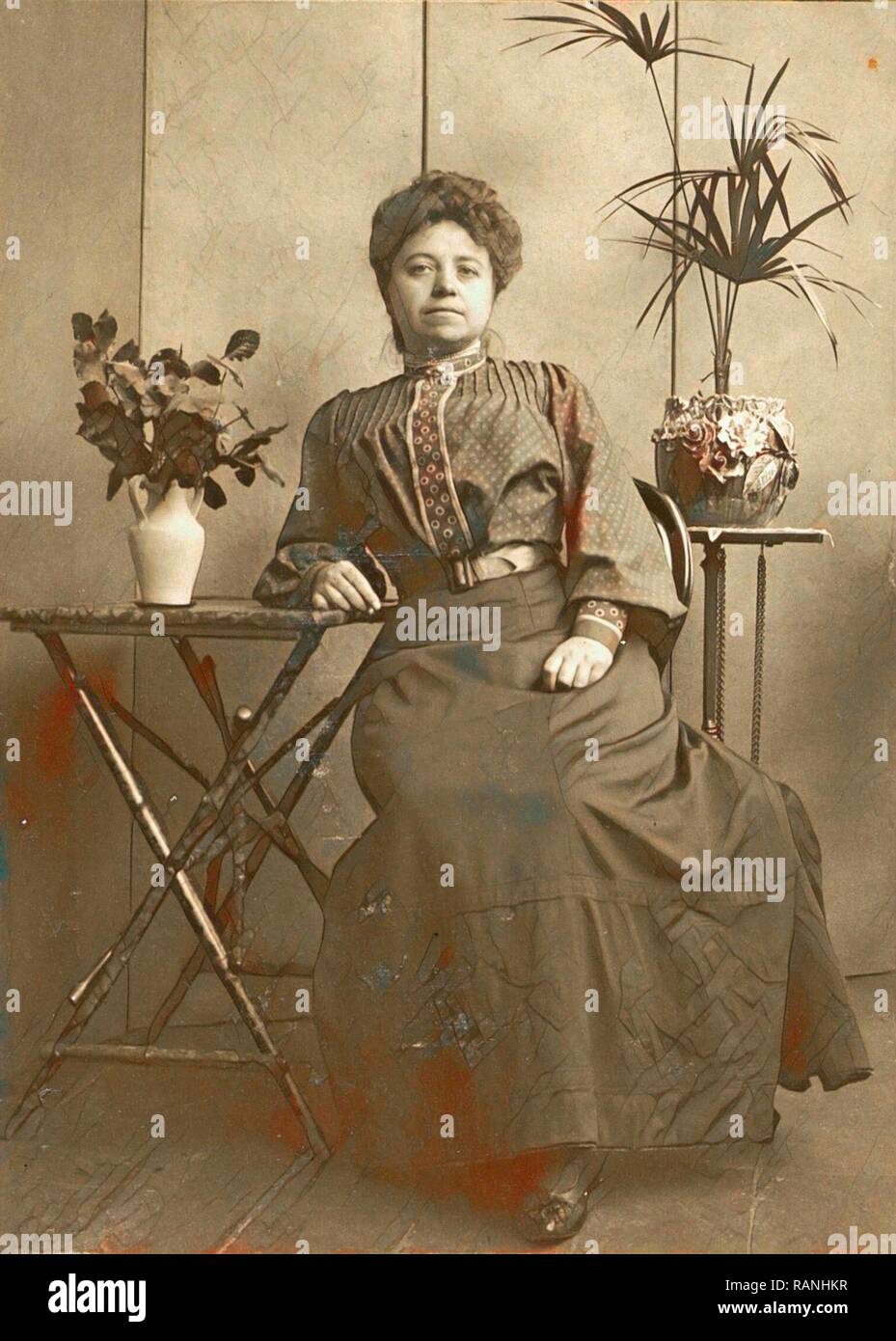 Woman sitting at tables with plants and flowers, Anonymous, c. 1900 - c ...