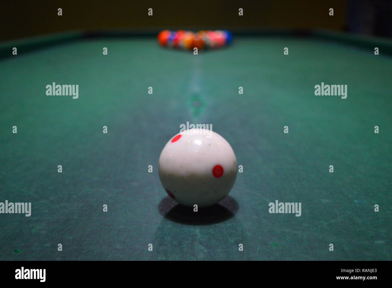 Game of pool, person playing pool and hitting balls Stock Photo - Alamy