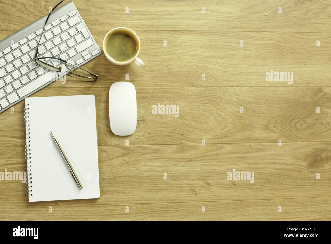 A cup of coffee on the office table Stock Photo - Alamy
