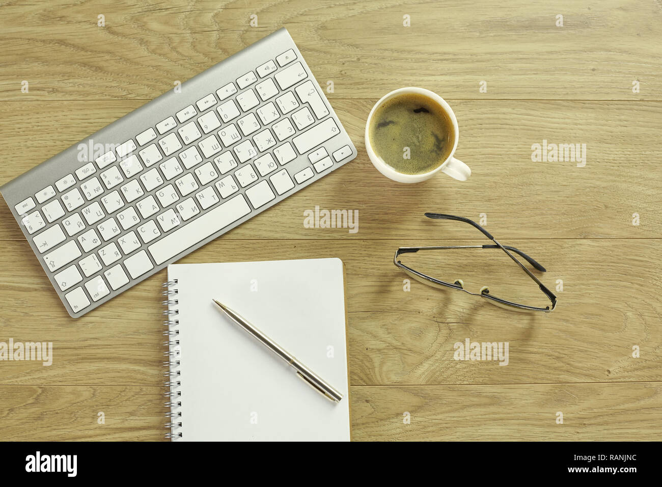 A cup of coffee on the office table Stock Photo - Alamy