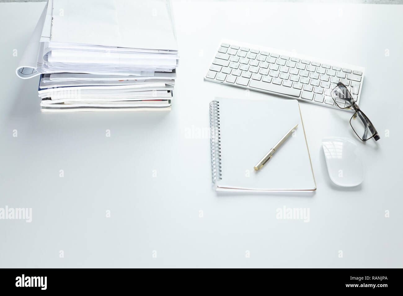 Workspace desktop, documents on the office table Stock Photo - Alamy