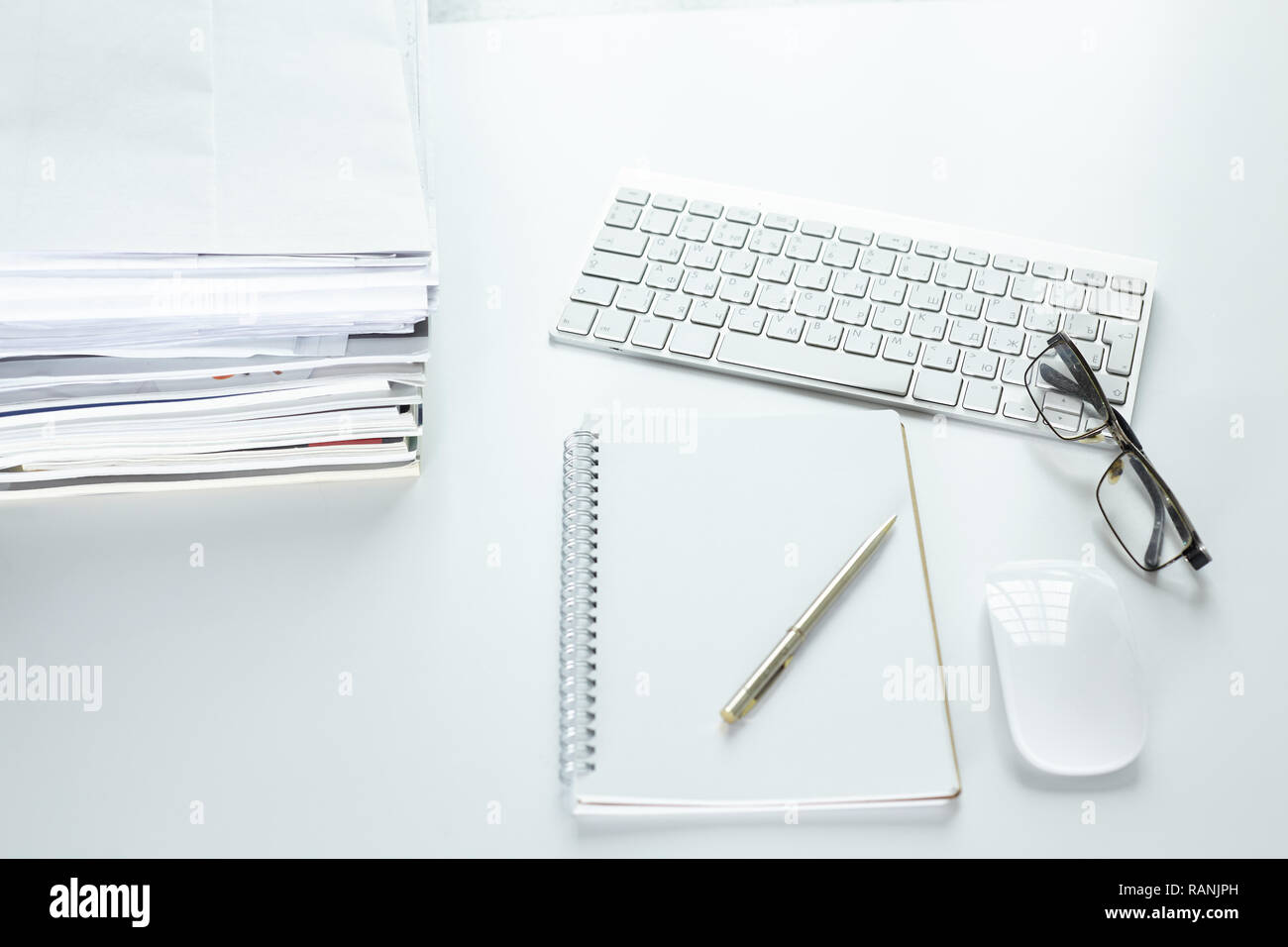Workspace desktop, documents on the office table Stock Photo - Alamy