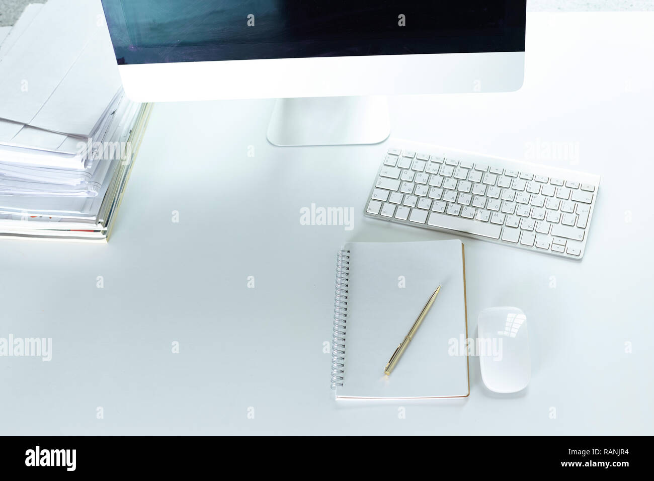 Workspace desktop, documents on the office table Stock Photo - Alamy
