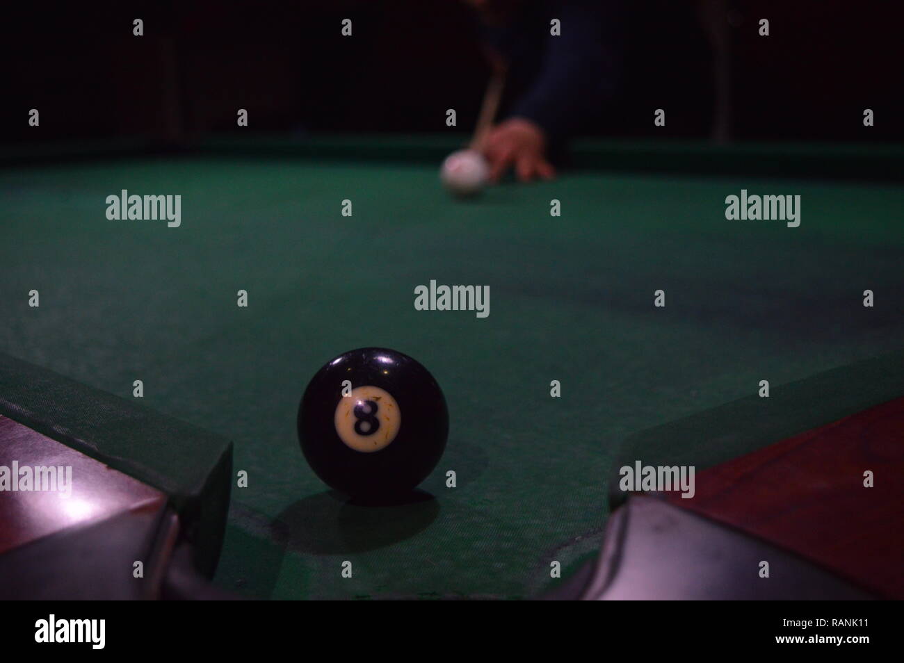 Game of pool, person playing pool and hitting balls Stock Photo - Alamy