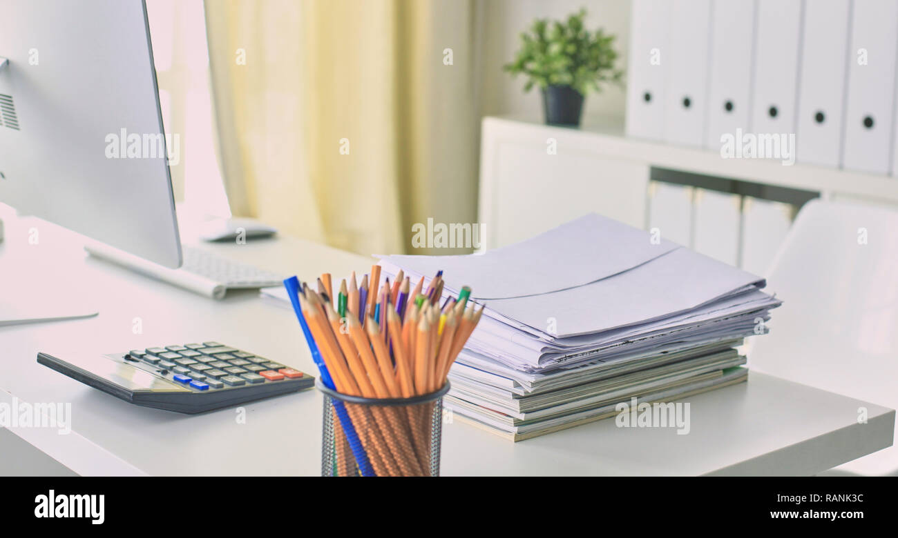 Workspace desktop, documents and pensils on the office table Stock ...