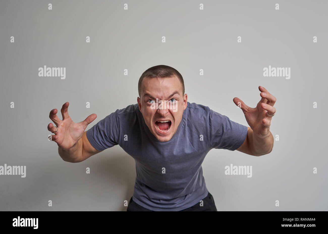 man angry on white background Stock Photo - Alamy