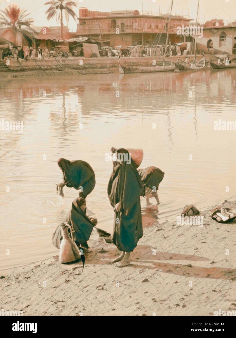 River scenes on the Euphrates taken at Hilla. Women washing clothes ...