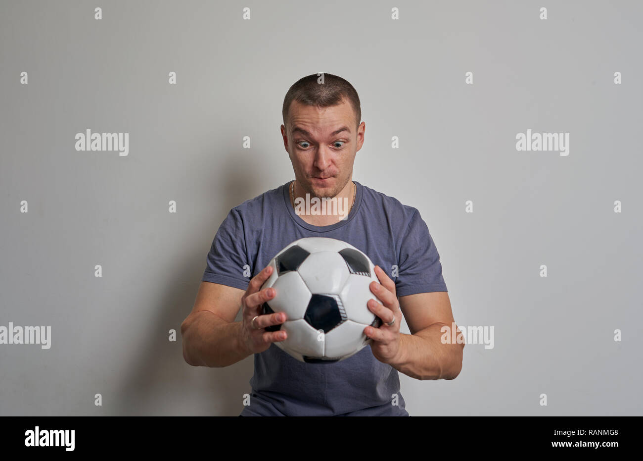 man with soccer ball on white background Stock Photo - Alamy
