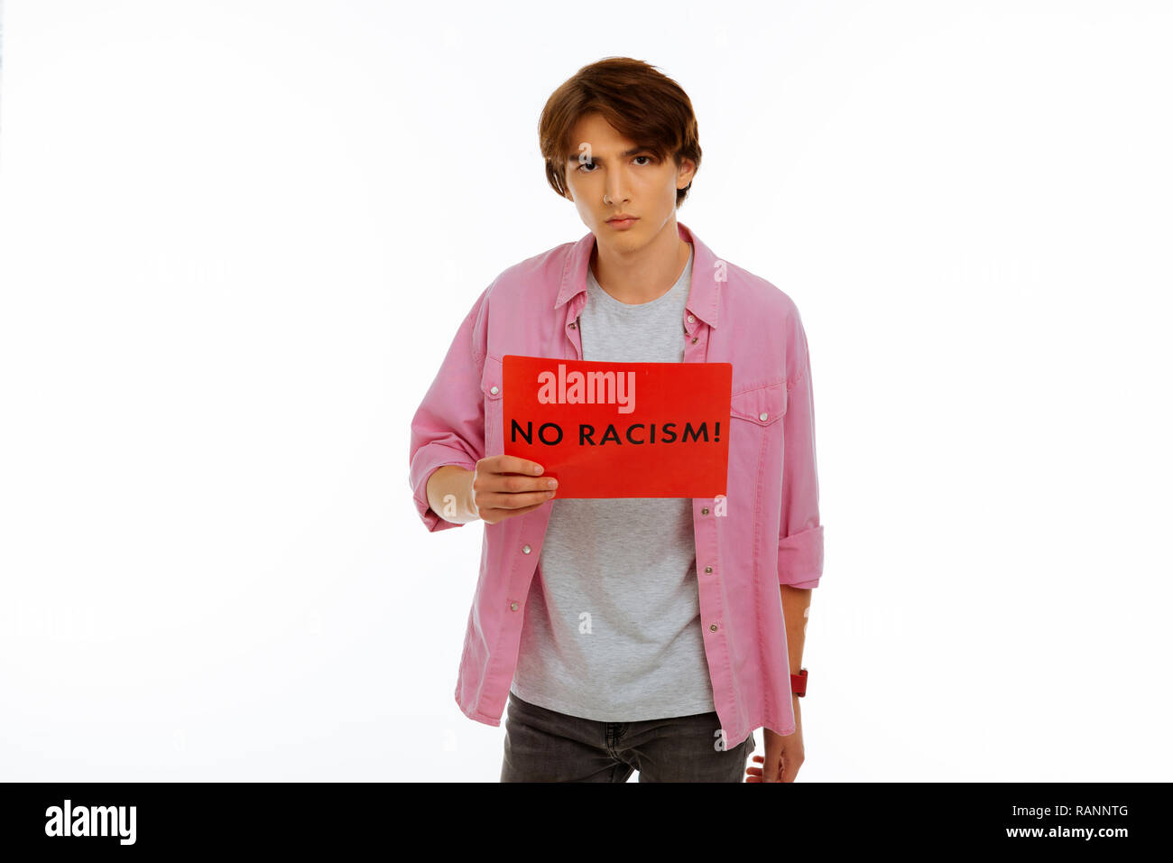 Nice serious man being tolerant to people Stock Photo - Alamy