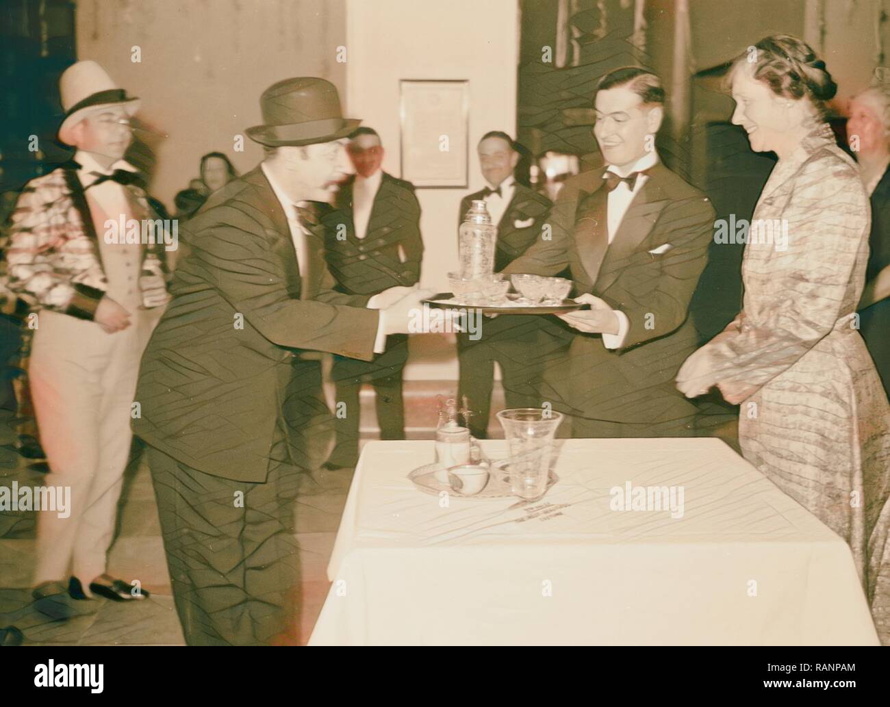 Shrove Tuesday celebration in King David Hotel, Mrs. Haining giving the ...