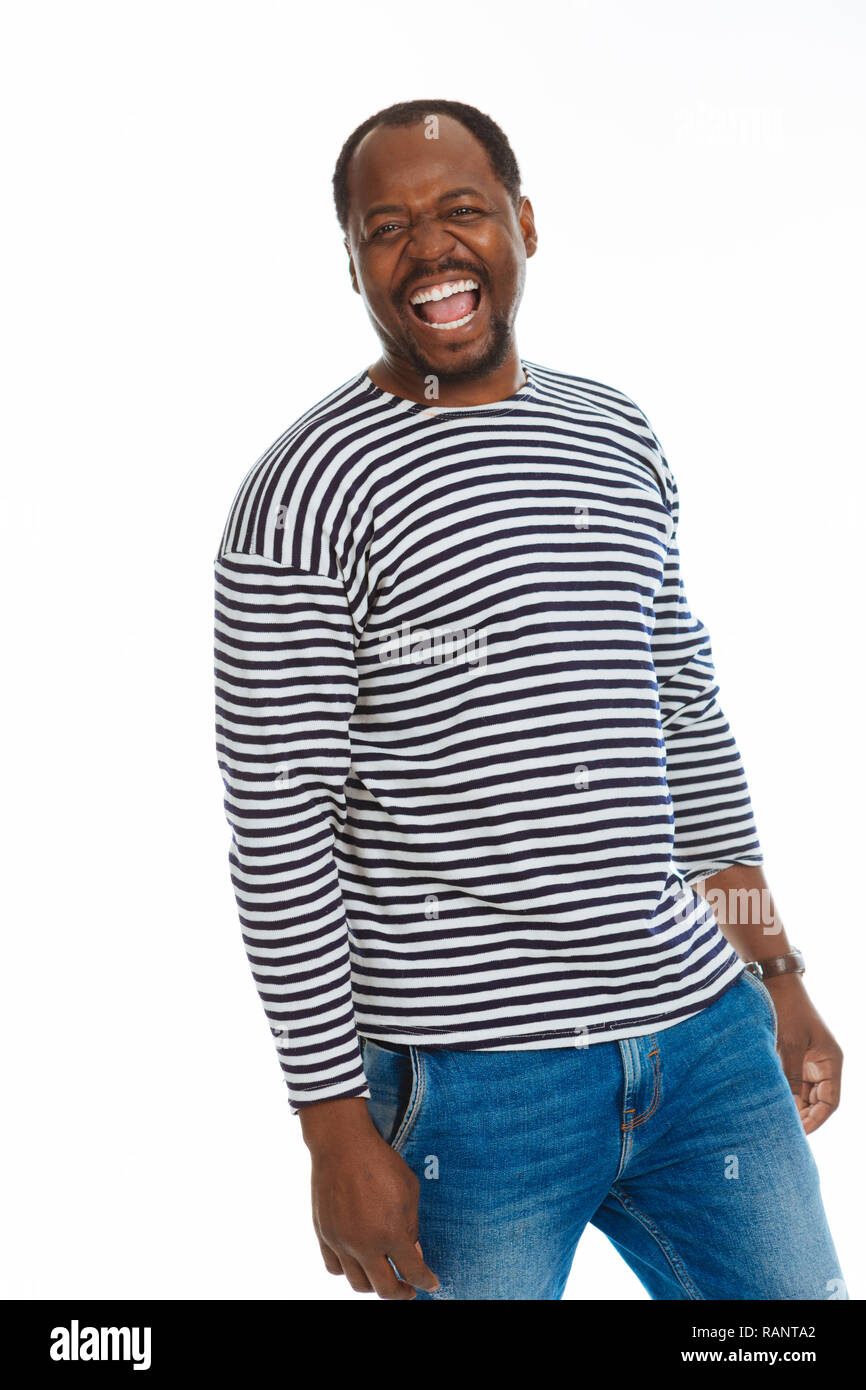 Happy afro American nice man enjoying himself Stock Photo - Alamy