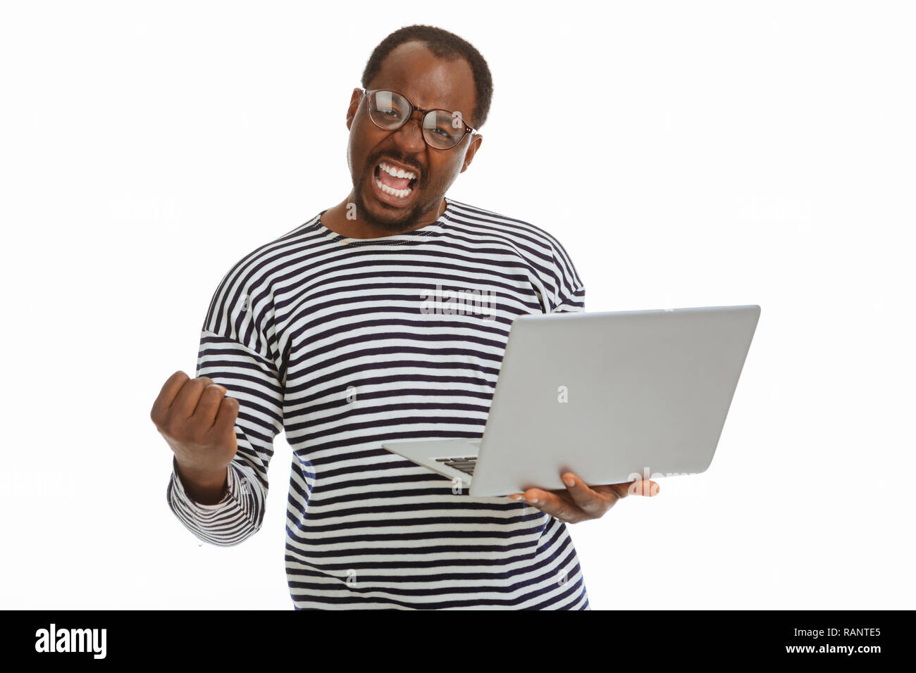 Joyful good looking man feeling very happy Stock Photo - Alamy
